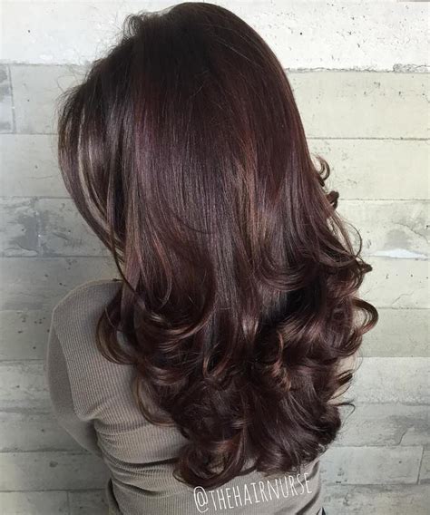 Long Layered Brunette Style With Curled Ends Layered Hair With Bangs