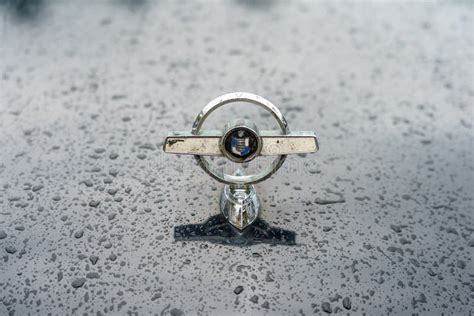 The Front Emblem Of Full Size Car Mercury Turnpike Cruiser In Rain Of