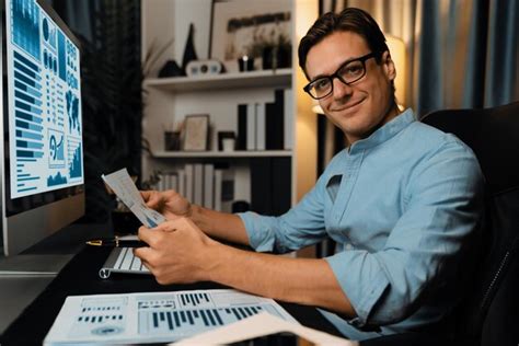 Premium Photo Businessman Holding Paperwork Report Looking At Camera On Pc Screen Pecuniary