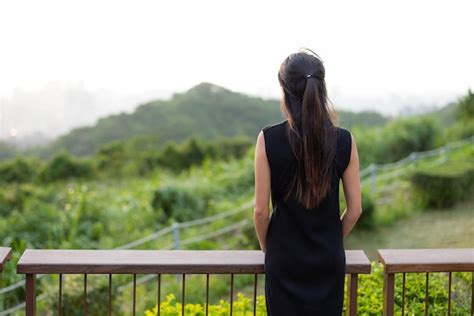 Premium Photo Woman Look At The City On Mountain