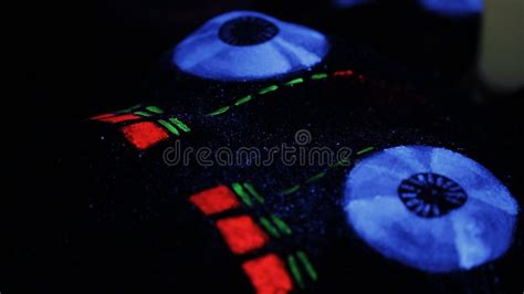 The Artist Draws A Fluorescent Powder On The Body Of A Naked Girl DJ Mixer Stock Footage Video