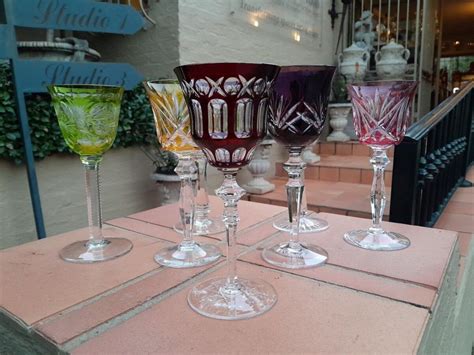 A 20th Century Collection Of Seven Coloured Bohemian Cut Crystal Wine