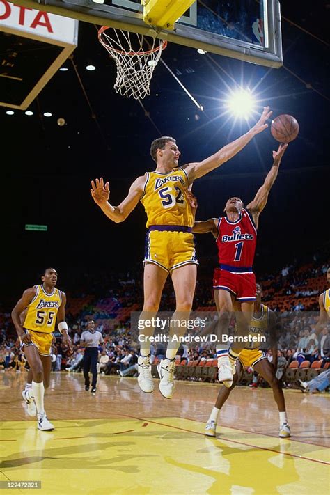 Mike Smrek Of The Los Angeles Lakers Blocks A Shot Attempt By Muggsy