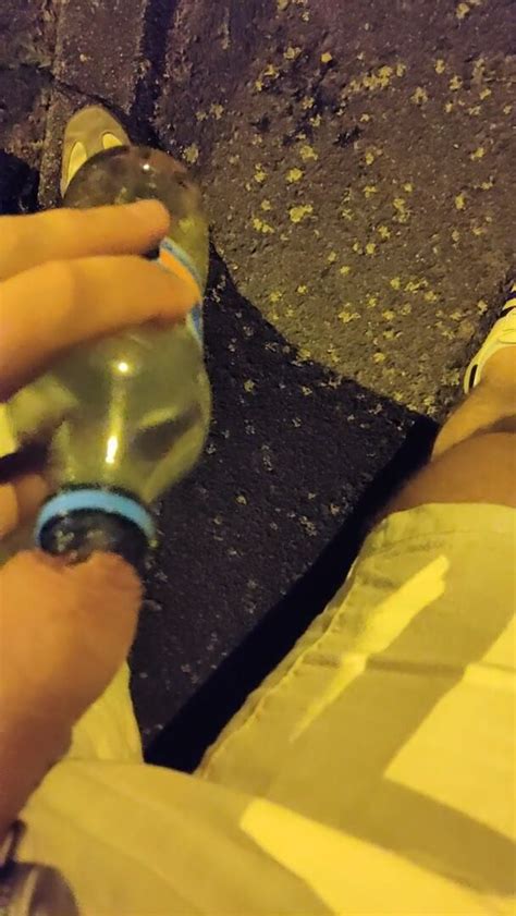 Big Cock Has A Messy Piss Into Bottle