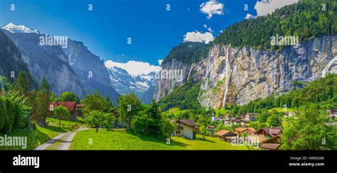 Famous Lauterbrunnen Valley With Gorgeous Waterfall And Swiss Alps In