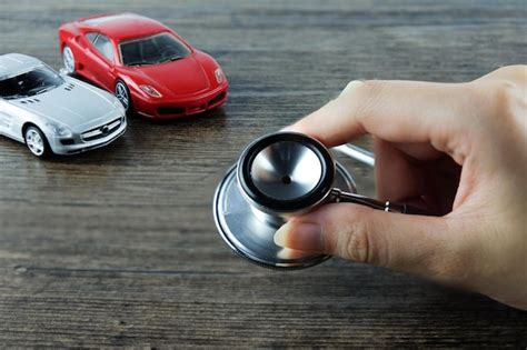 Premium Photo High Angle View Of Man Driving Car On Table