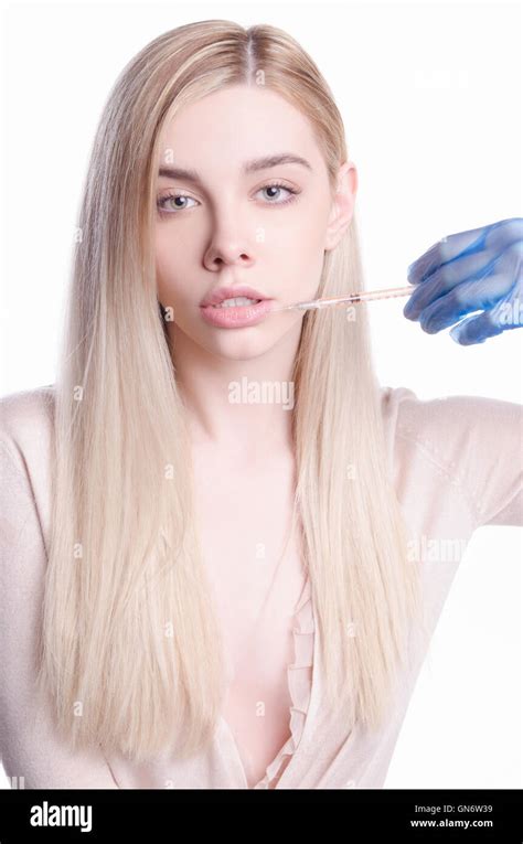 Beautiful Spa Woman Receives Procedures For Injections Of Botox For The Face Improves The