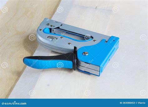 Construction Stapler Is On Surface Of Material Stock Image Image Of