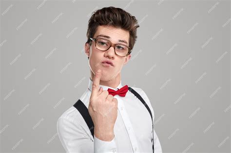 Premium Photo Goofy Nerd In Glasses Showing Finger