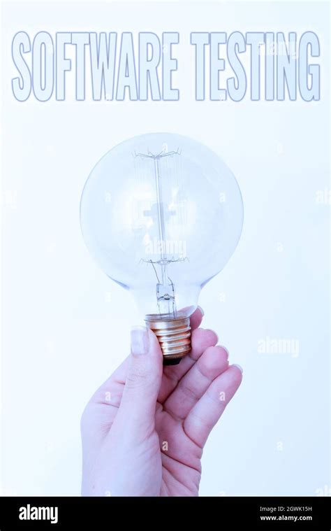 Hand Writing Sign Software Testing Word Written On Evaluate The Functionality Of A Software