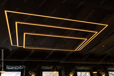 Unusual Rectangular Design Lamps On The Ceiling In An Expensive