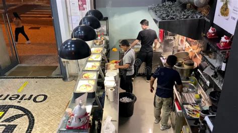 Ramen Chefs In An Asian Cafe Cooking And Preparing Dishes Stock Video