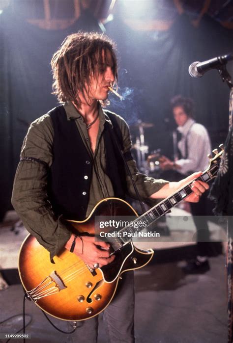 American Rock Musician Izzy Stradlin Plays Guitar With His Band Izzy