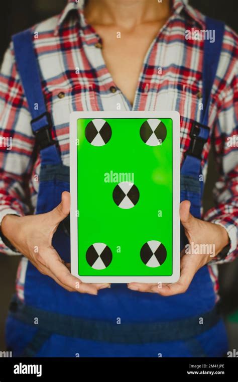 Mock Up Green Screen Tablet For Construction Calculations In Woman