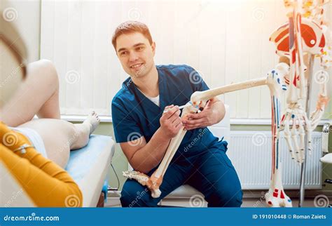 Patient With Orthopedist Doctor In His Office Royalty Free Stock Image