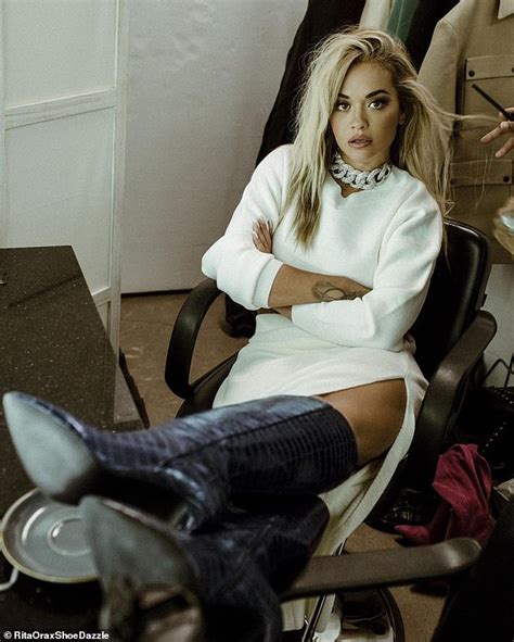 Rita Ora Looks Sensational In A White Blazer Dress And Newspaper Print