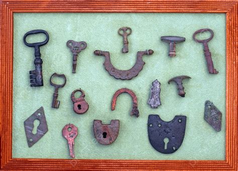A Wooden Framed Assemblage Of Vintage Keys And Locks Photo Background