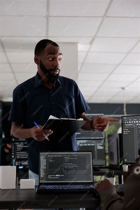 Premium Photo African American Web Developer Analyzing Html Script On Terminal Window Using