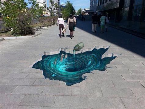 Явган хүний зам дээр 3d зураг зурж байна