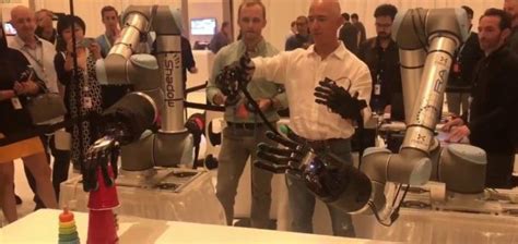 Jeff Bezos Tries Out Some Giant Robotic Hands Unexplained Mysteries