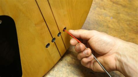 How To Restring A Bass Guitar Guidance From A Professional Guitar Repairer With Pictures