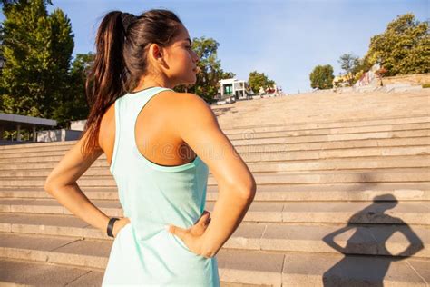 Sports Woman Preparing For A Challenge Motivated Female Athlete Training Hard Stock Photo