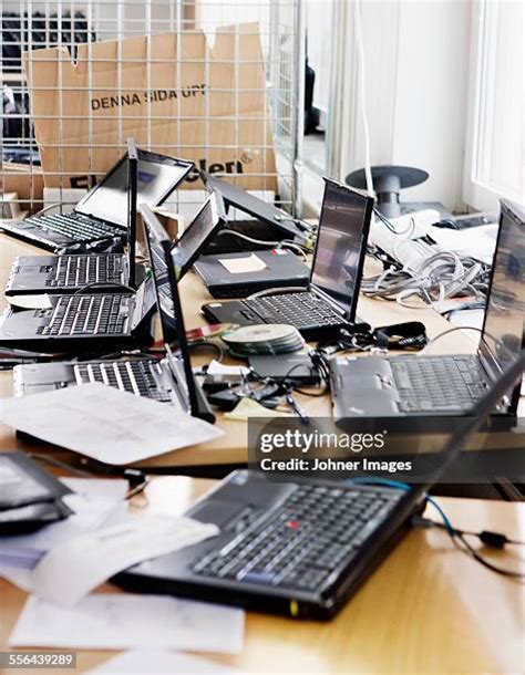 Messy Desktop Laptop Photos And Premium High Res Pictures Getty Images