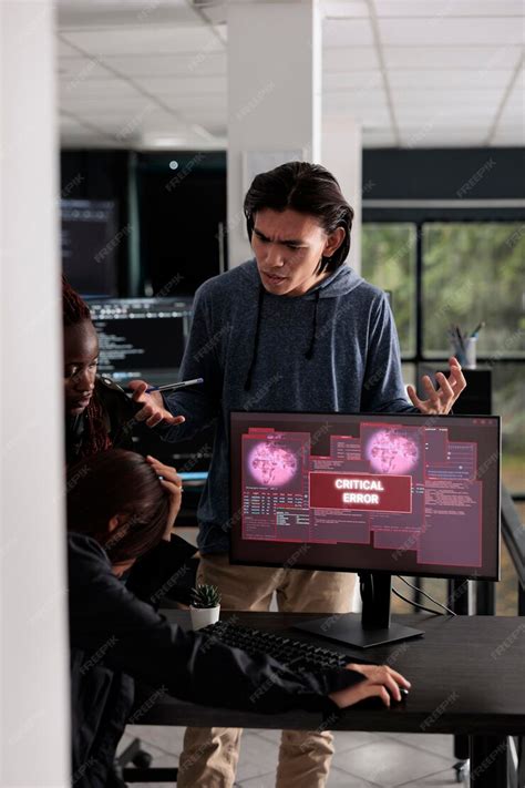 Premium Photo Multi Ethnic Team Of It Programmers Having Hacked Server And Security Breach