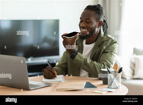 Digital Speaker Application Happy Black Male Freelancer Using Voice Assistant On Smartphone