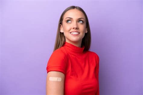 Premium Photo Young Caucasian Woman Wearing Band Aid Isolated On