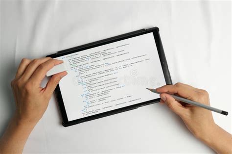 Programming And Coding Concept Code Generation Listing Screen And Two Hands One Holding A