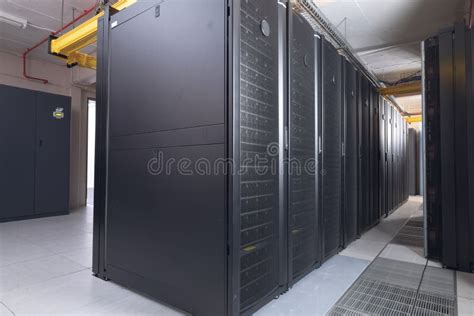 Data Center With Multiple Rows Of Fully Operational Server Racks Stock Image Image Of