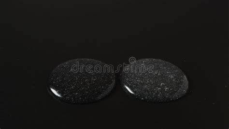 Xanthan Gum Liquid And Guar Gum Solution Drains Into A Dark Surface Food Additives With Numbers