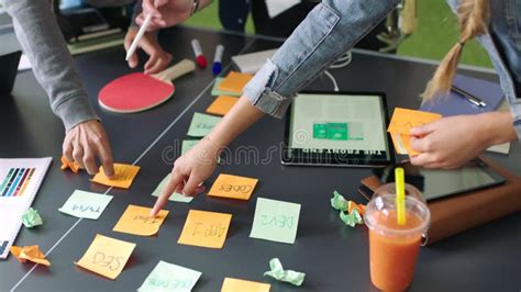 Brainstorming Team Planning And Technology Sticky Notes And Tablet