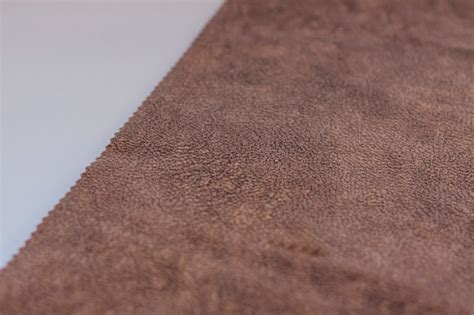 베이지 색 배경에 직물 가구 및 의류의 장식을위한 자연 및 인공 직물로 만든 배경 가구 생산 텍스트를 복사할 수 있는 공간이 있는 벽지 0명에 대한 스톡 사진 및 기타