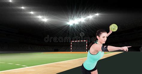 Young Caucasian Female Handball Player Pointing While Playing At Illuminated Stadium Stock Image