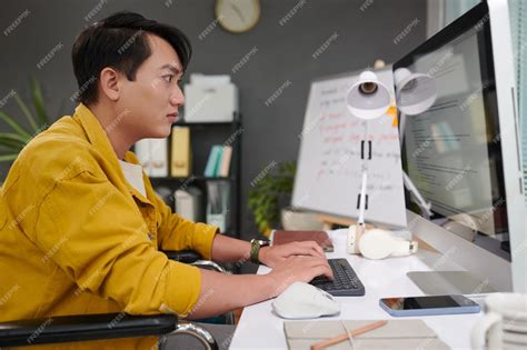 Premium Photo Young Man With Disability Working As Software Developer
