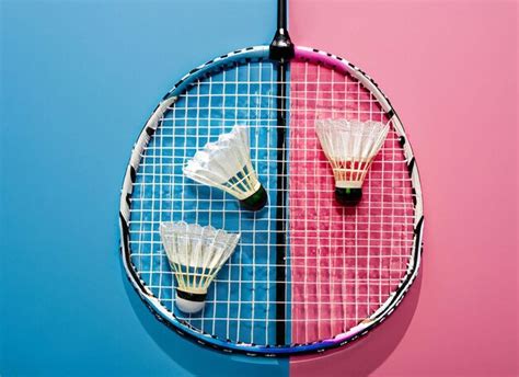 Premium Ai Image A Blue And Pink Racket With The Word Badminton On It