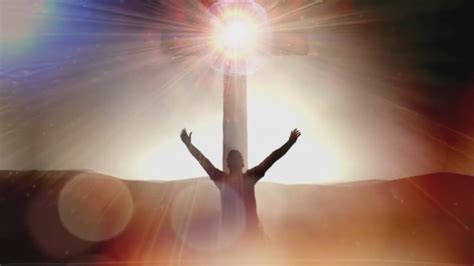 Man Praying At Cross
