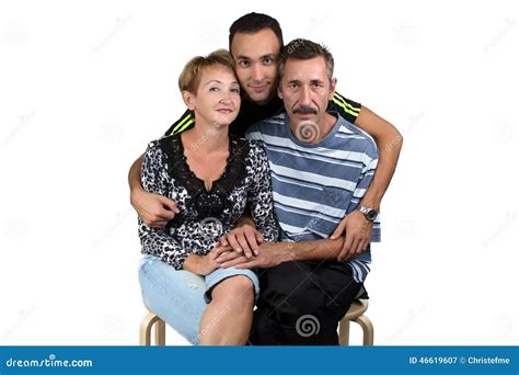 Foto De La Familia Feliz De Abrazo Imagen De Archivo Imagen De Lifestyle Mirando