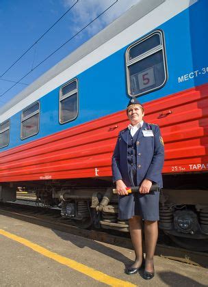 Provodnitsa Carriage Attendant During Transsiberian Railway Photos