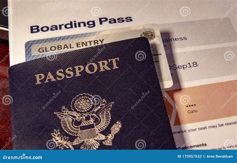 Global Entry Card With USA Passport And Airline Boarding Pass Stock