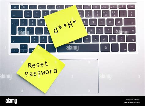 Sticky Notes With Phrase Reset Password And Posscode On Laptop Top