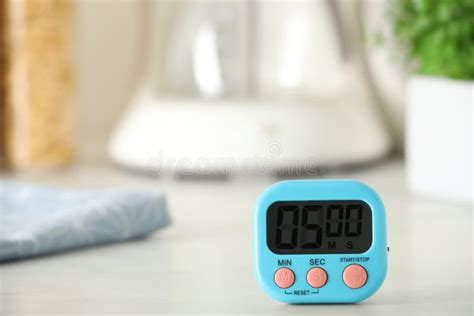 Digital Kitchen Timer On White Table Indoors Space For Text Stock
