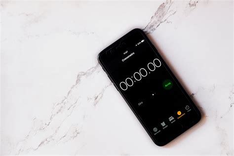 00 00 00 Ios 검은 색 스마트 폰 고급 표면 고품질 구슬 기기 기술 깔끔한 깨끗한 디자인 단순한 대리석 질감 디지털 시계 디지털 타이머