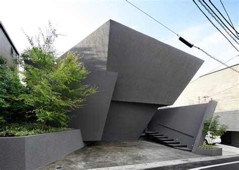 Angular Black Walls Fold Around Srk House By Artechnic
