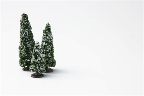 Premium Photo Snowy Needleleaf Tree Miniatures Isolated White Background