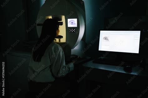 Perimetry Eye Test For Early Signs Of Glaucoma In Women At An Ophthalmology Clinic Measuring