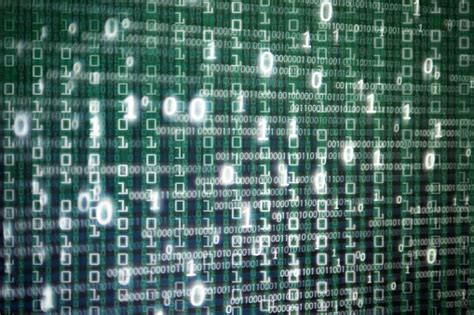 Binary Code Data Bit Screen Display On Laptop Computer Screen Matrix Of Data Flow Rise Of The