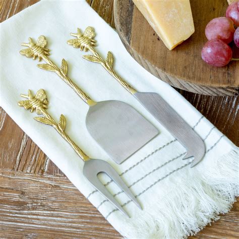 honey bee handled cheese servers cotton and crete